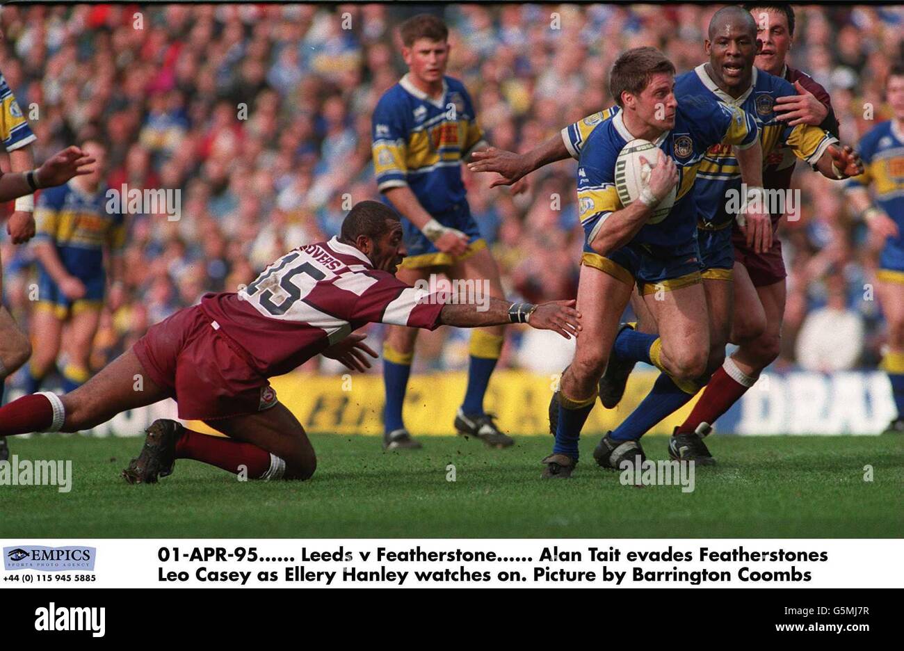 01-APR-95. Leeds v Featherstone. Alan Tait evades Featherstones Leo ...