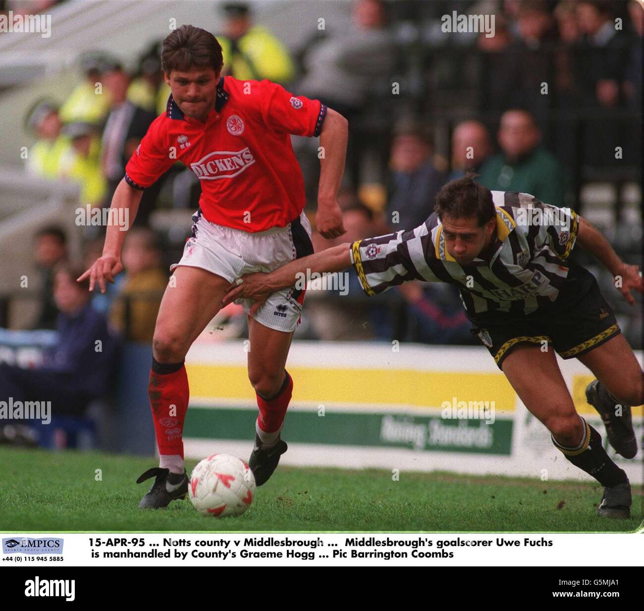 Middlesbroughs goalscorer uwe fuchs is manhandled by notts countys hogg ...