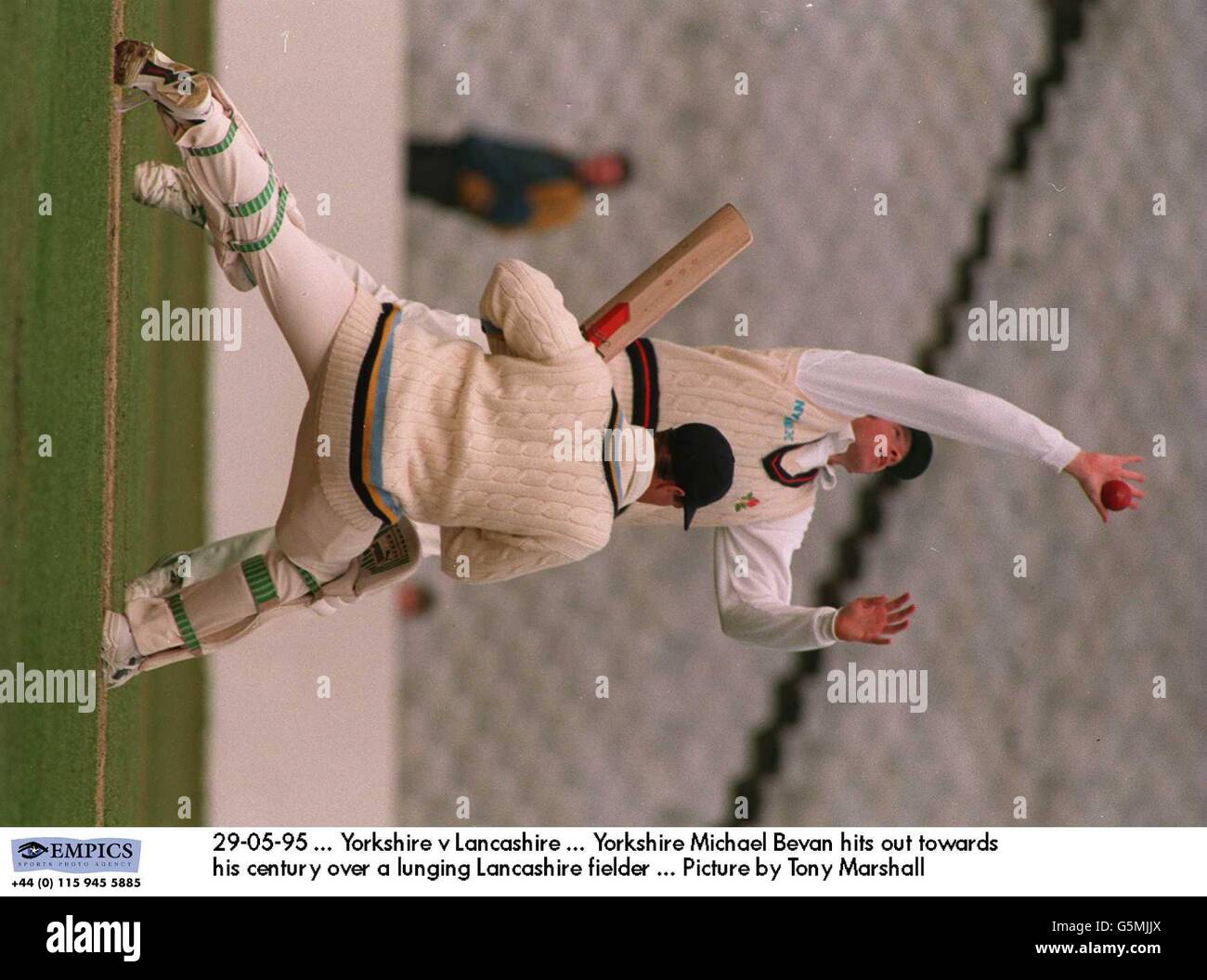 Yorkshire's Michael Bevan hits out towards his century over a lunging ...