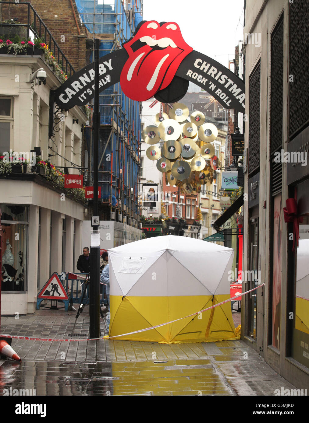 A police cordon at the scene of a stabbing incident in Kingly Street ...