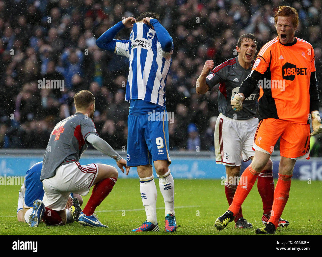 Brighton's Ashley Barnes hides his face after missing a penalty while ...