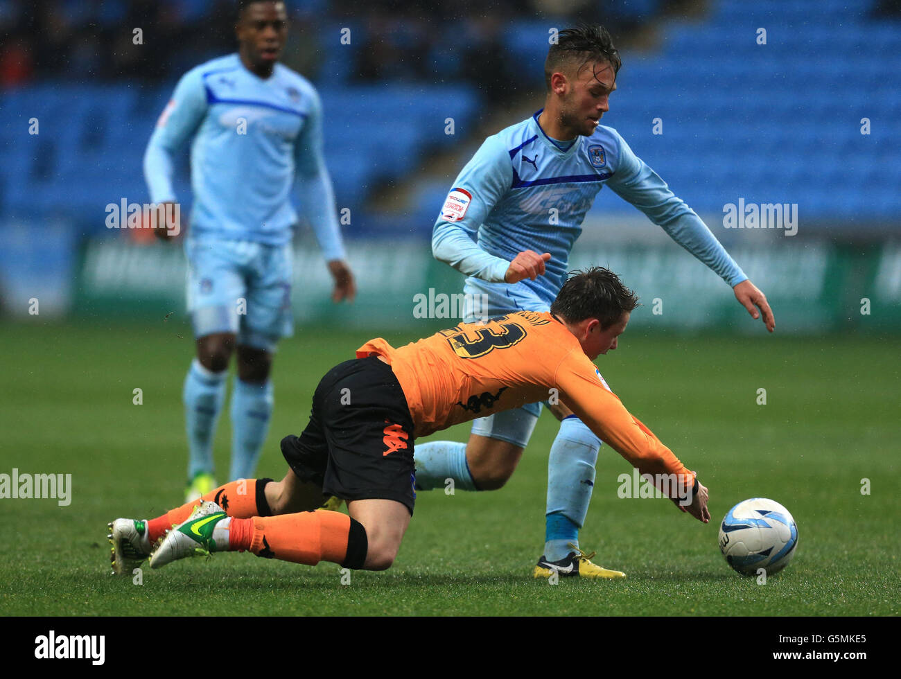 Coventry City's James Bailey and Portsmouth's Scott Allan in action ...