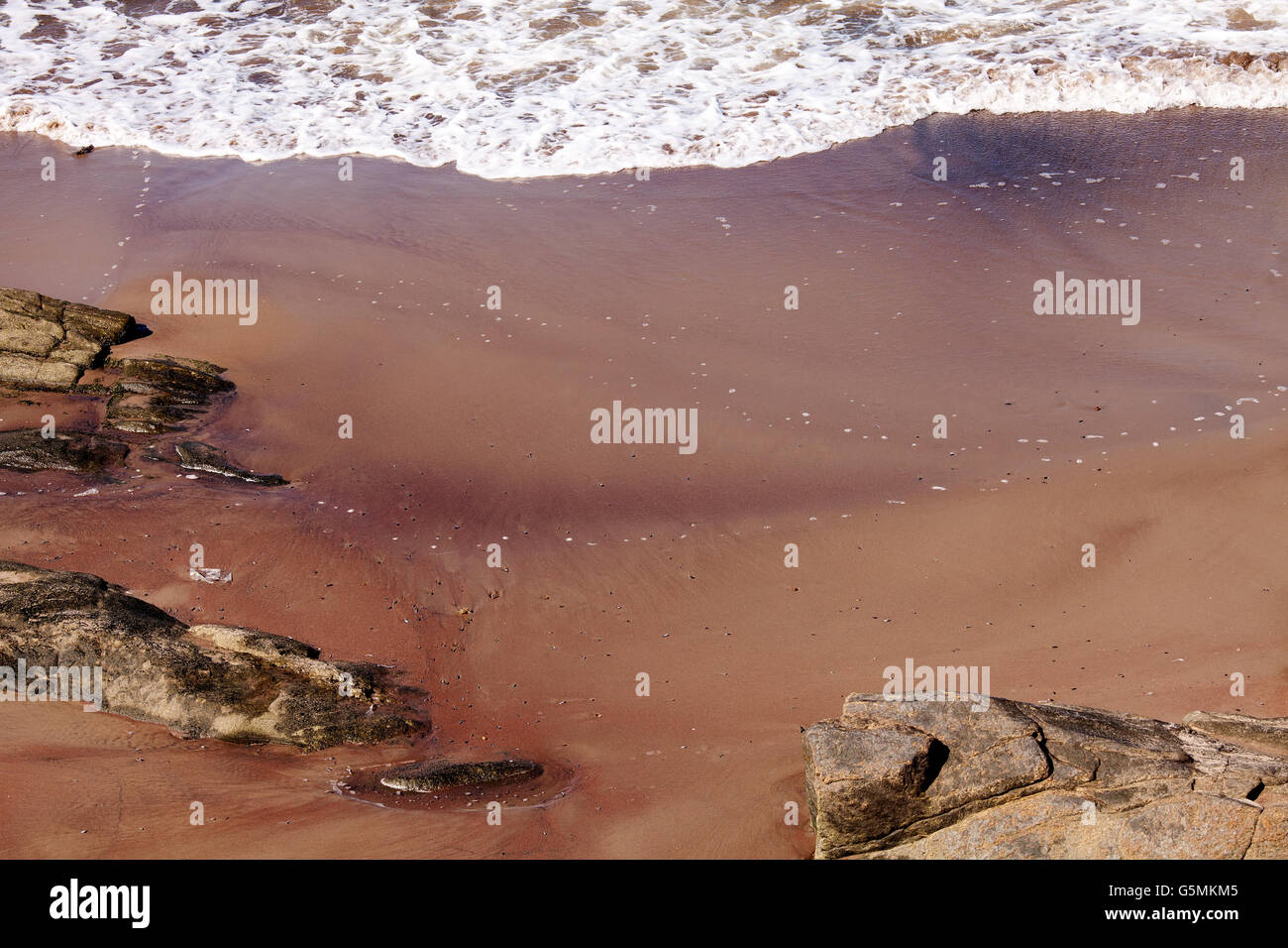 Sandy beach at the rocks hi-res stock photography and images - Alamy