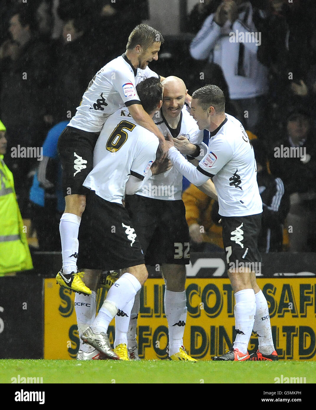 Derby County's Conor Sammon (2nd right) celebrates with team mates ...