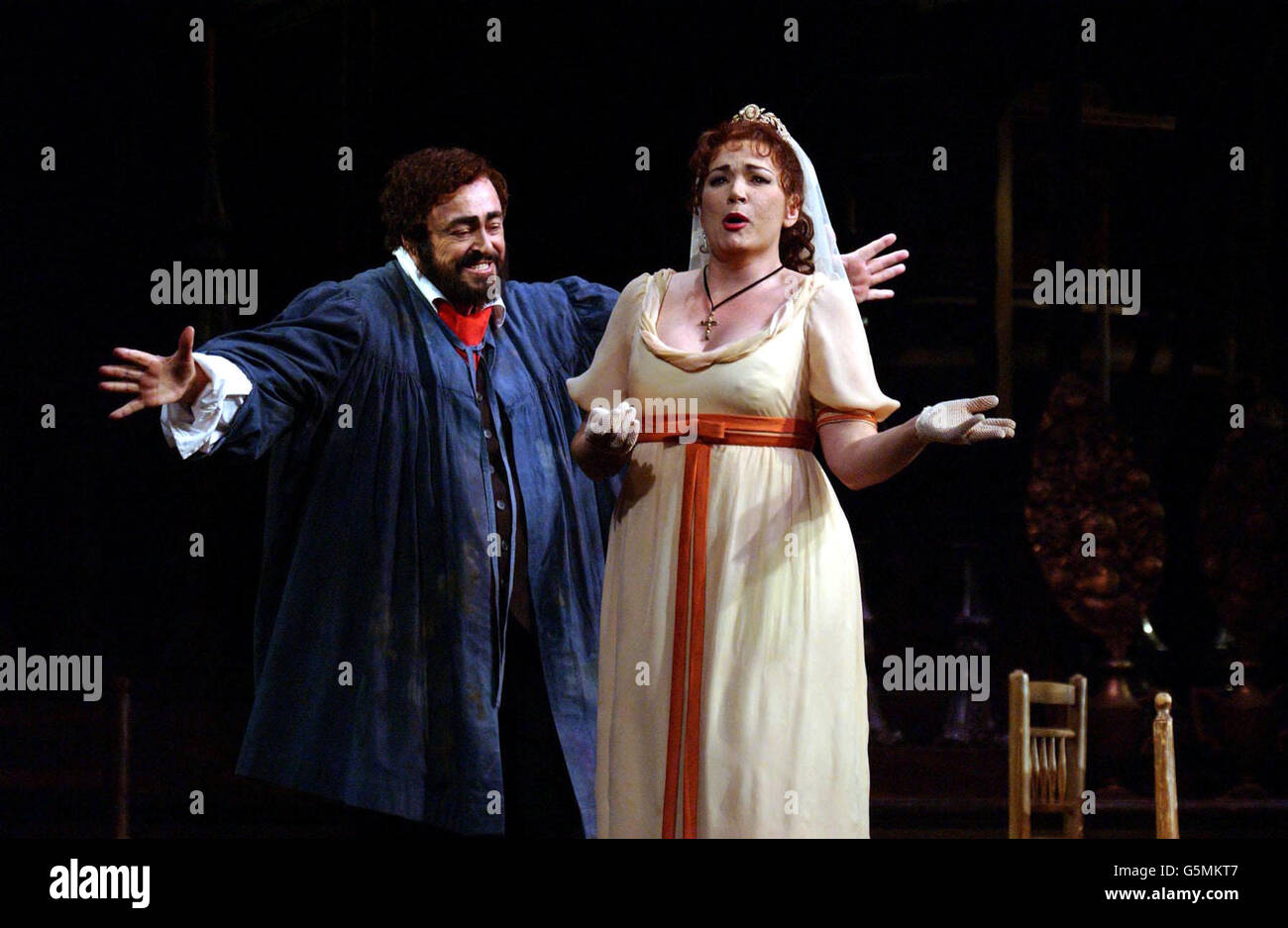 Italian tenor Luciano Pavarotti who plays Cavaradossi, on stage with ...