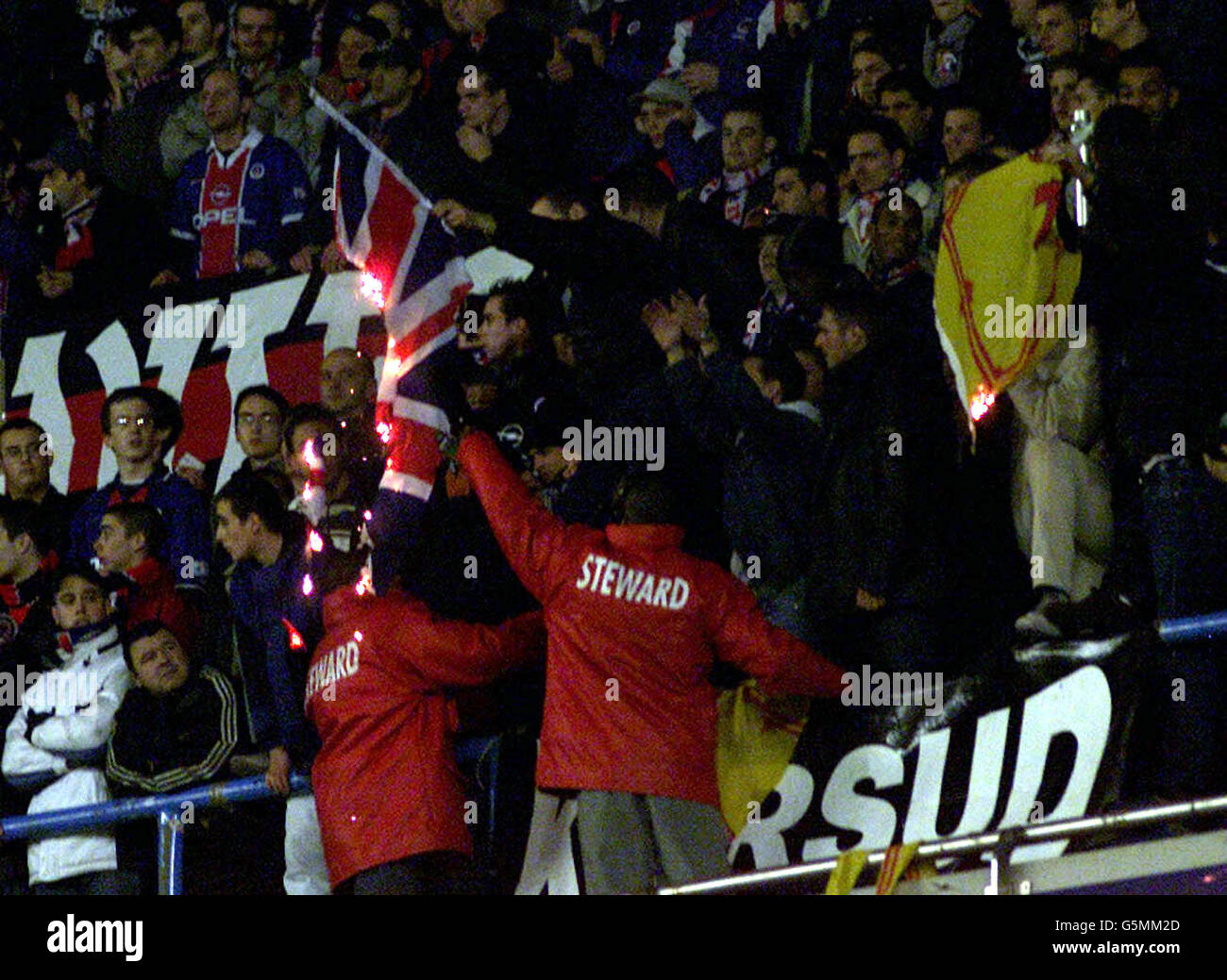 PSG's fans burn the Union Jack Flag during the U.E.F.A. Cup 3rd round ...
