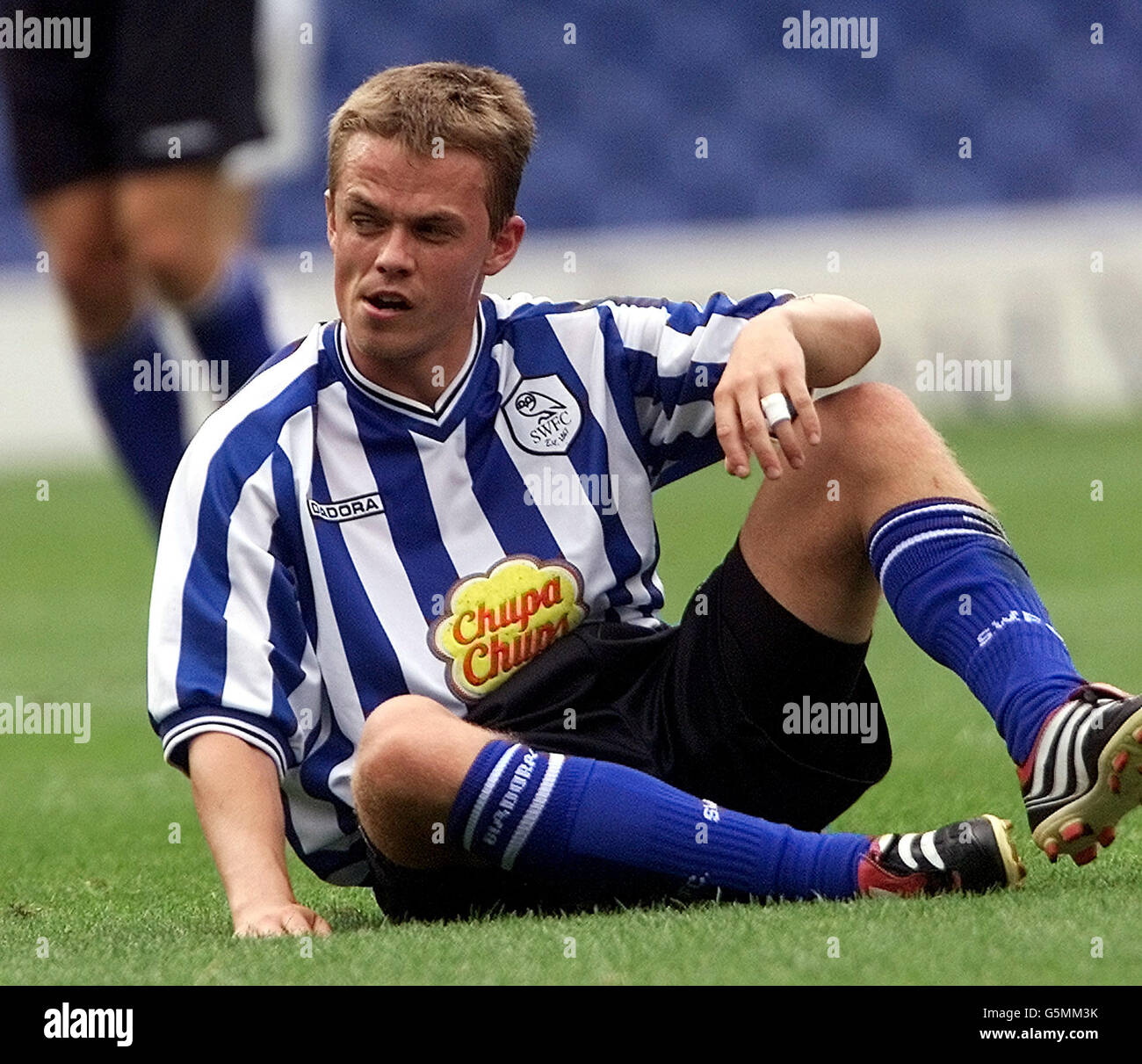 Sheffield Wednesday's Simon Donnelly takes a sudden fall in the game ...