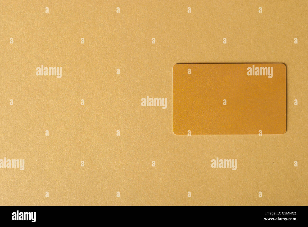 Brown card on desk Stock Photo - Alamy