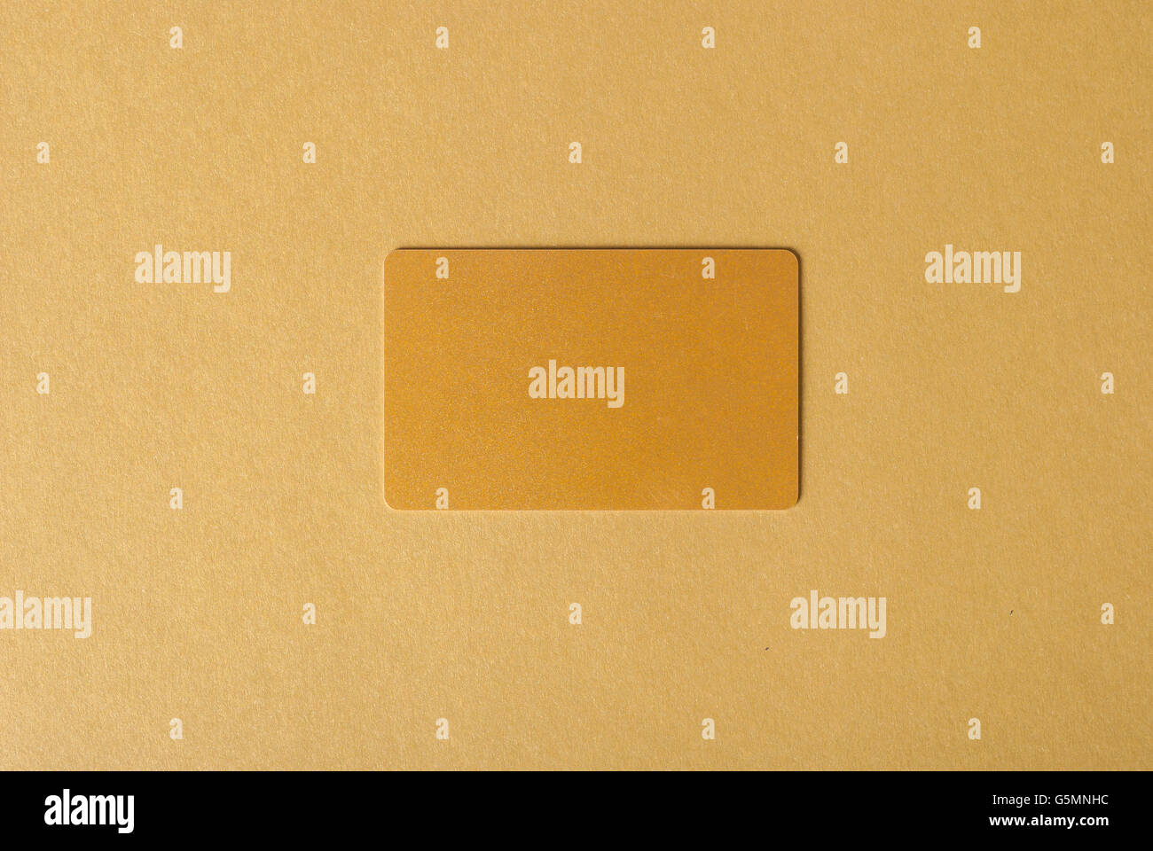 Brown card on desk Stock Photo - Alamy