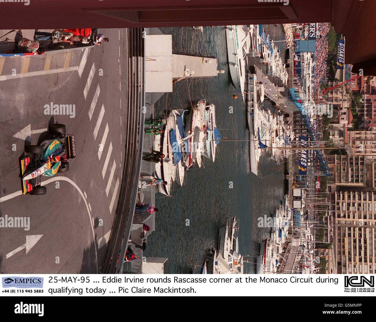 25-MAY-95, Eddie Irvine rounds Rascasse corner at the Monaco Circuit ...