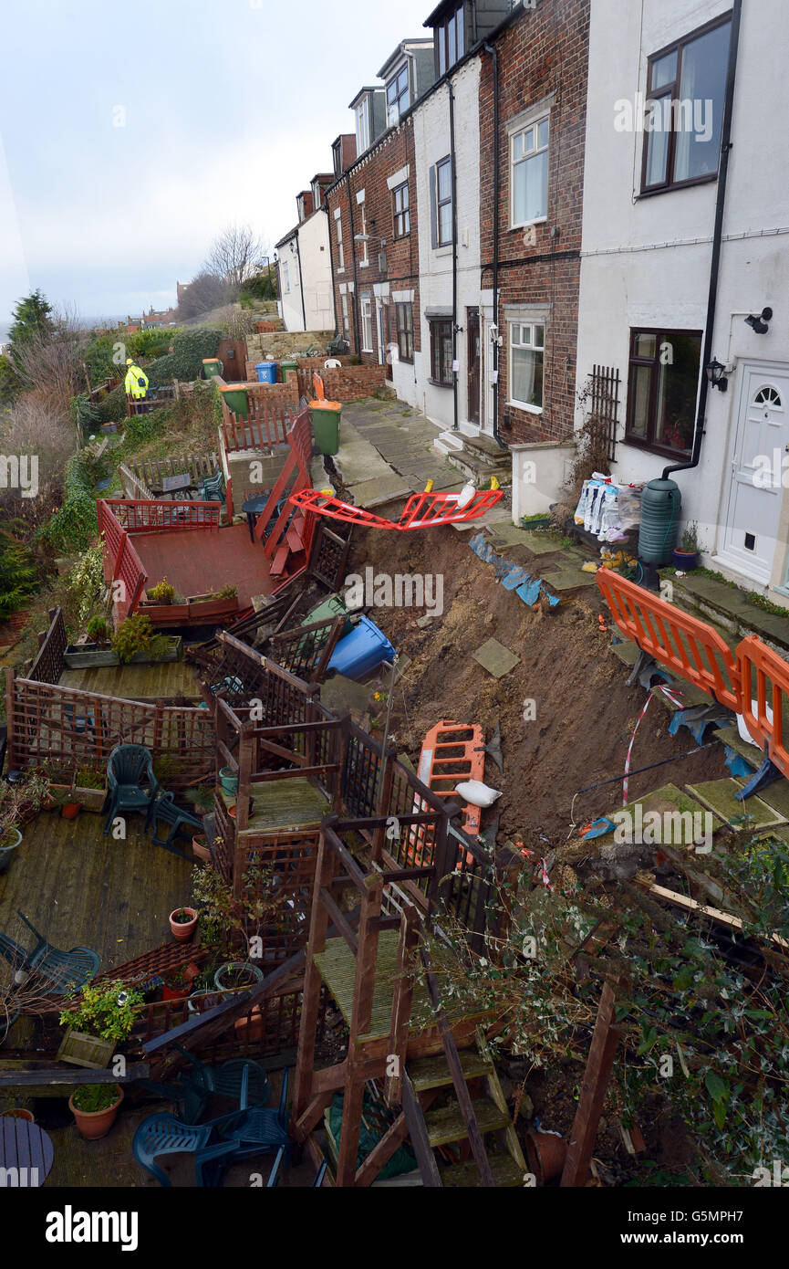 A row of seven cottages high above Whitby harbour are collapsing down ...