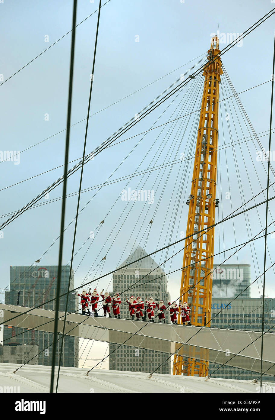 Santas finish pre-Christmas training on the O2 Stock Photo - Alamy