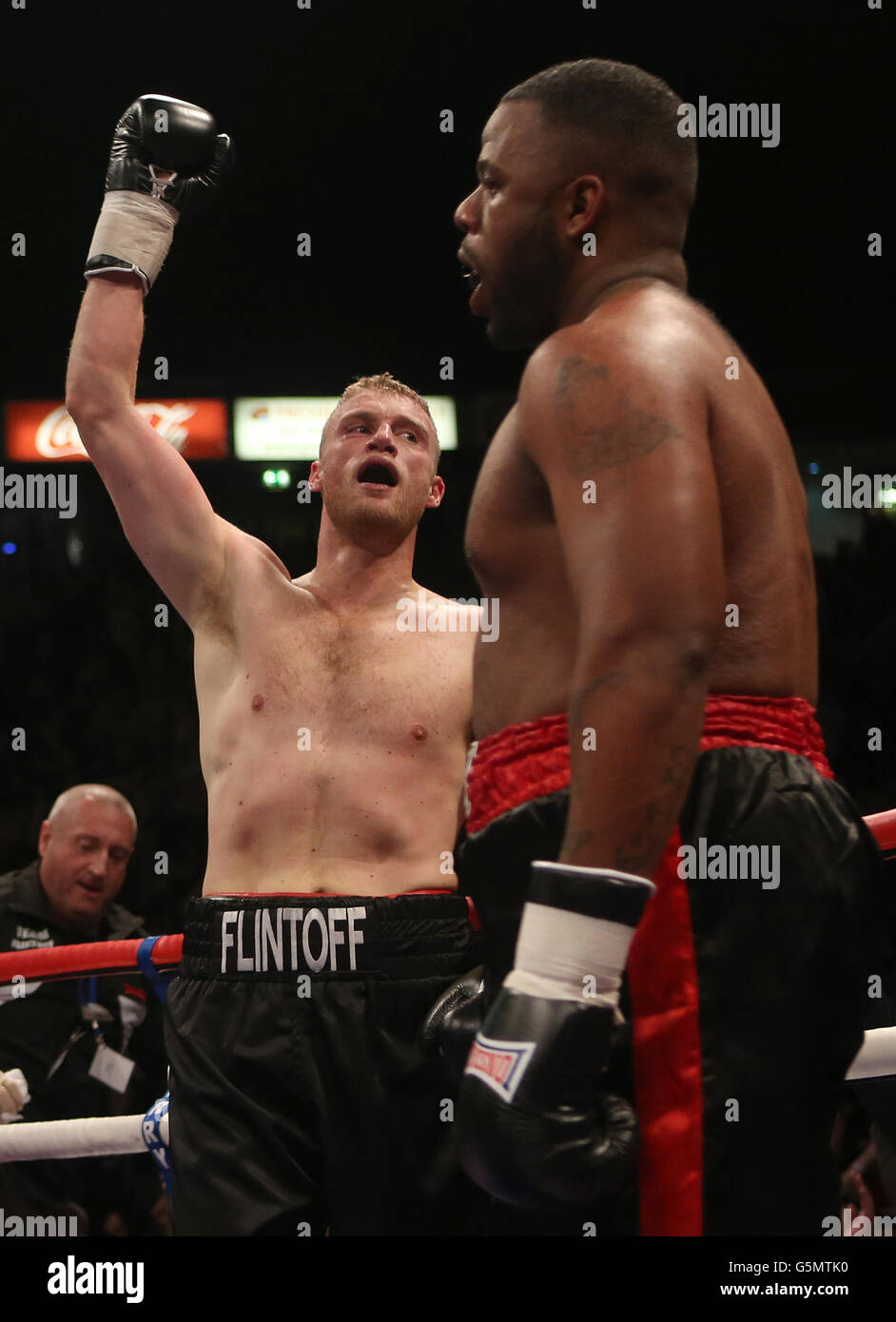 Andrew Flintoff celebrates his victory over Richard Dawson (right ...