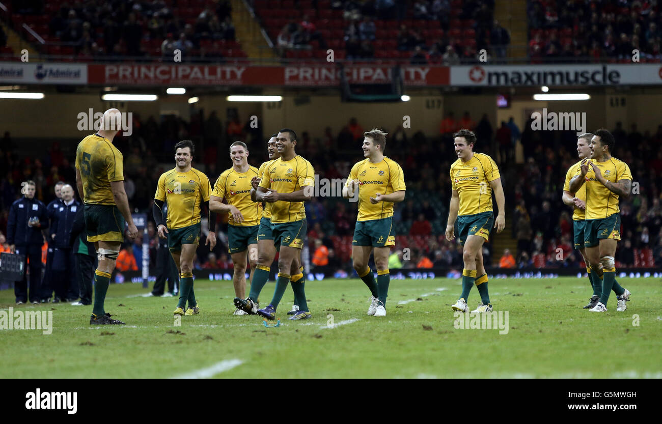 Australia's players approach Nathan Sharpe to congratulate him on his ...