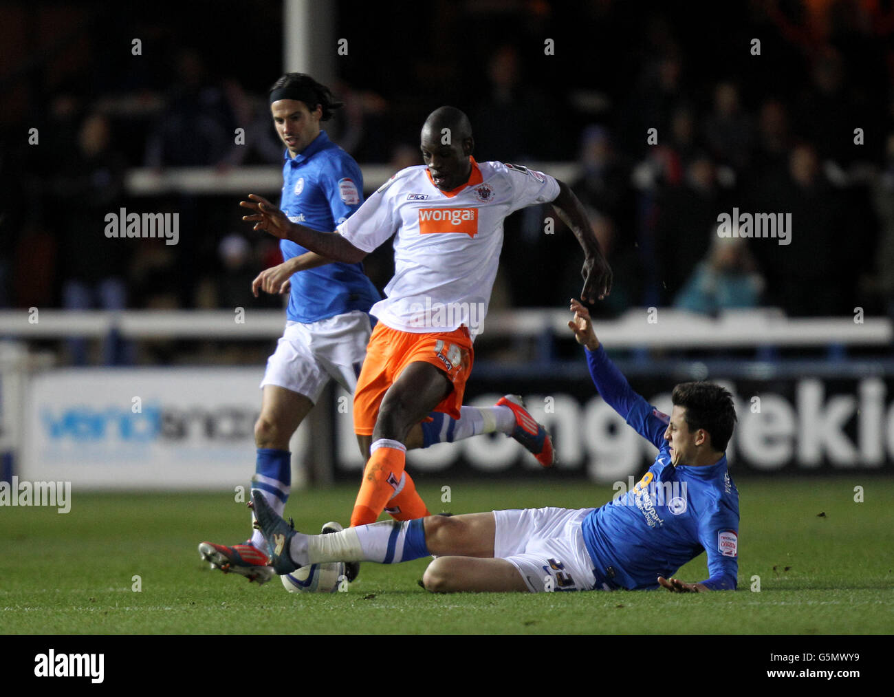 Peterborough uniteds george thorne tackles blackpools isaiah osbourne ...