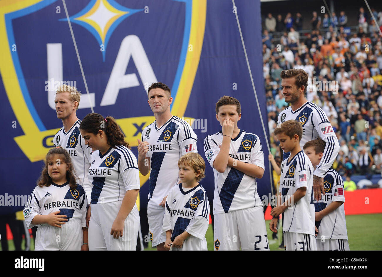 LA Galaxy's Robbie Keane (centre) with David Beckham (right) and ...
