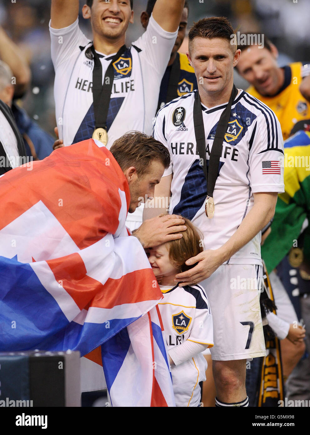 LA Galaxy's David Beckham with Robbie Keane (right) after they won the ...