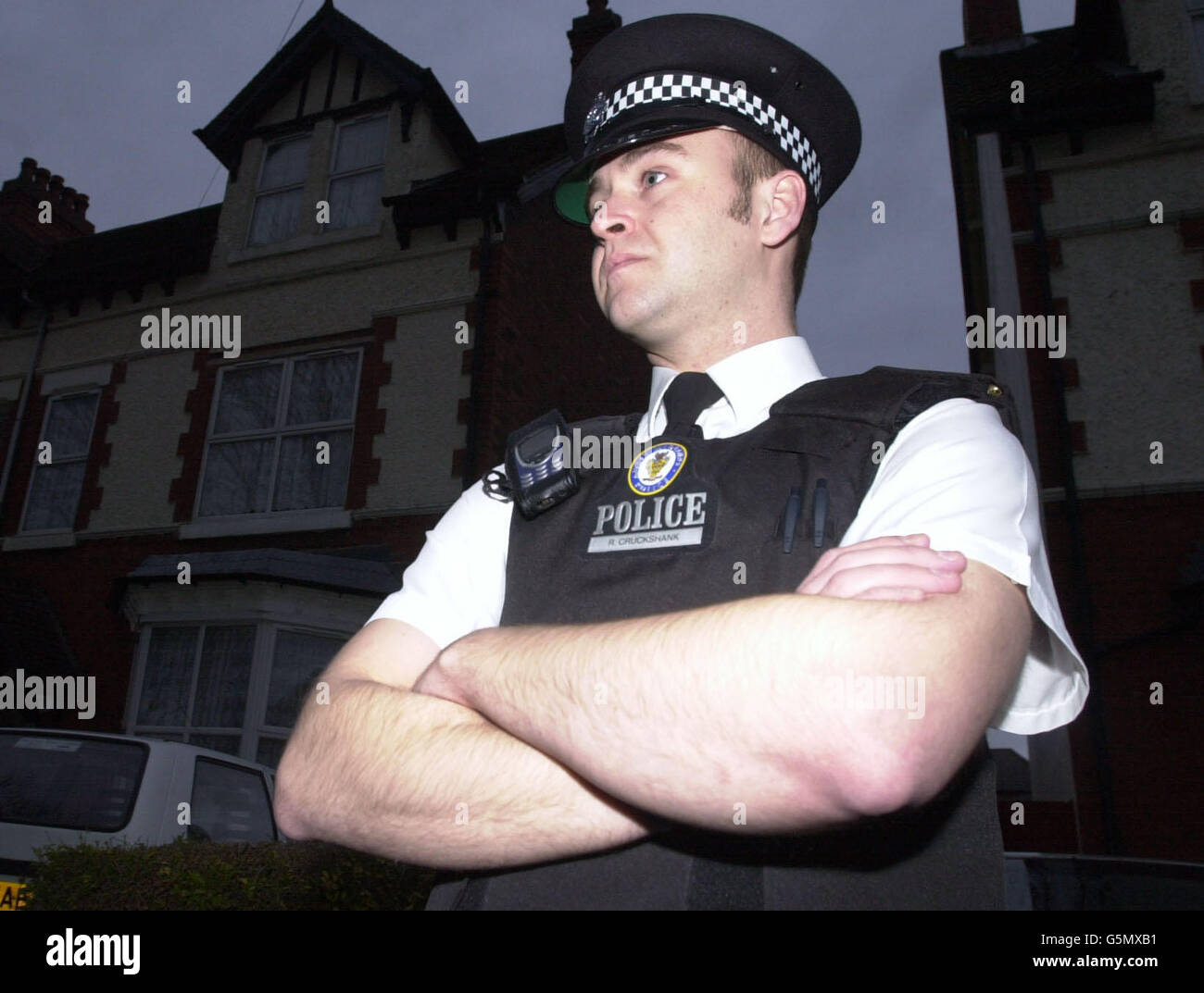 Police search a house in Victoria Street, Tipton, West Midlands ...