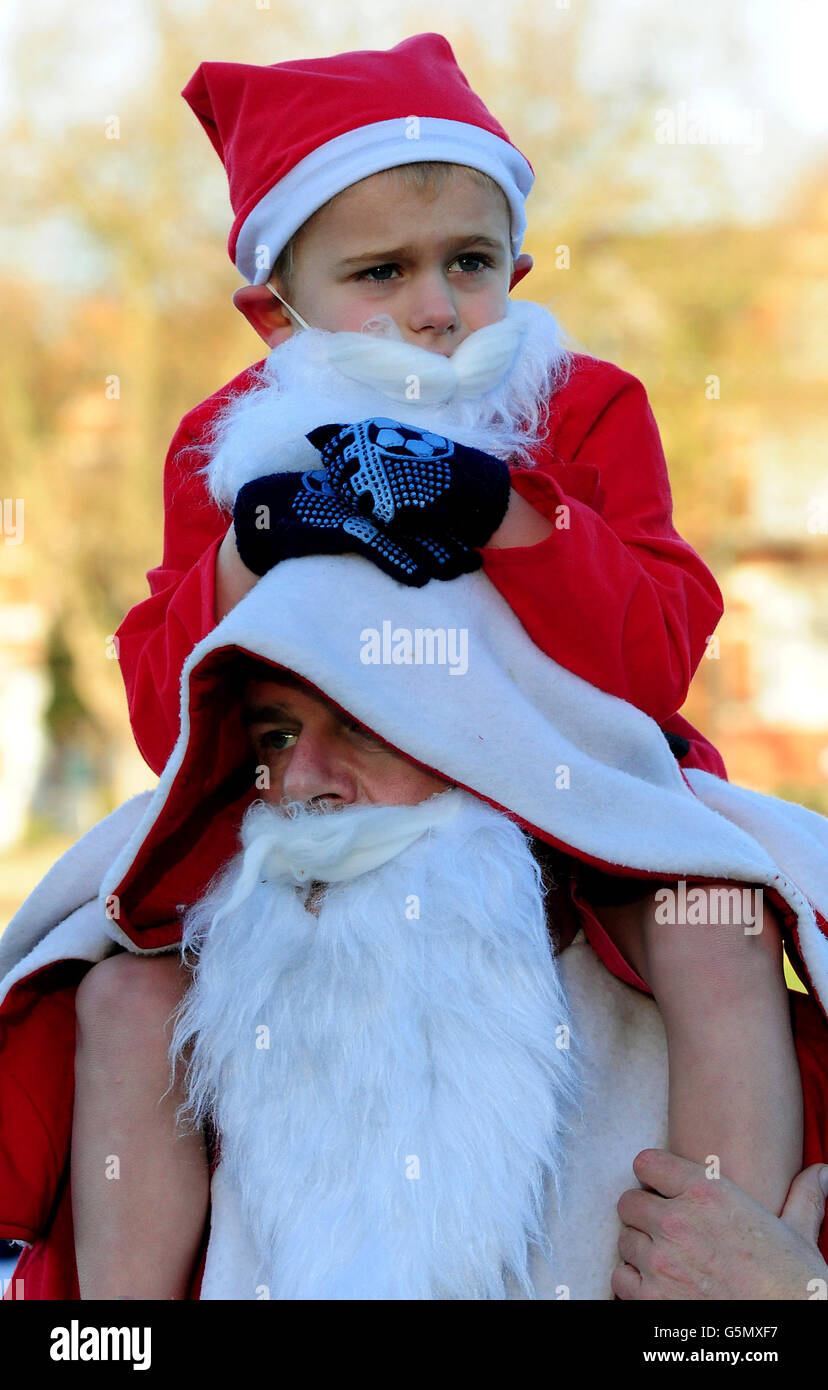Neil Matthewswith and his son Liam from Nottingham take part in the ...