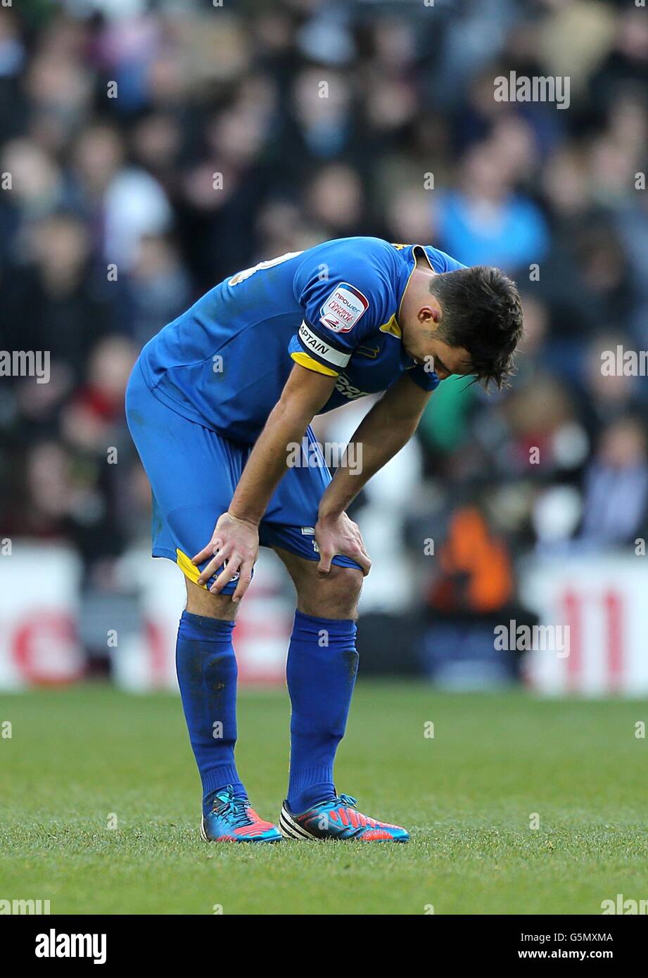 AFC Wimbledon's Steven Gregory appears dejected after the final whistle ...