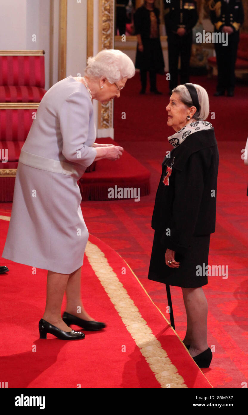 Receives obe queen buckingham palace hi-res stock photography and ...