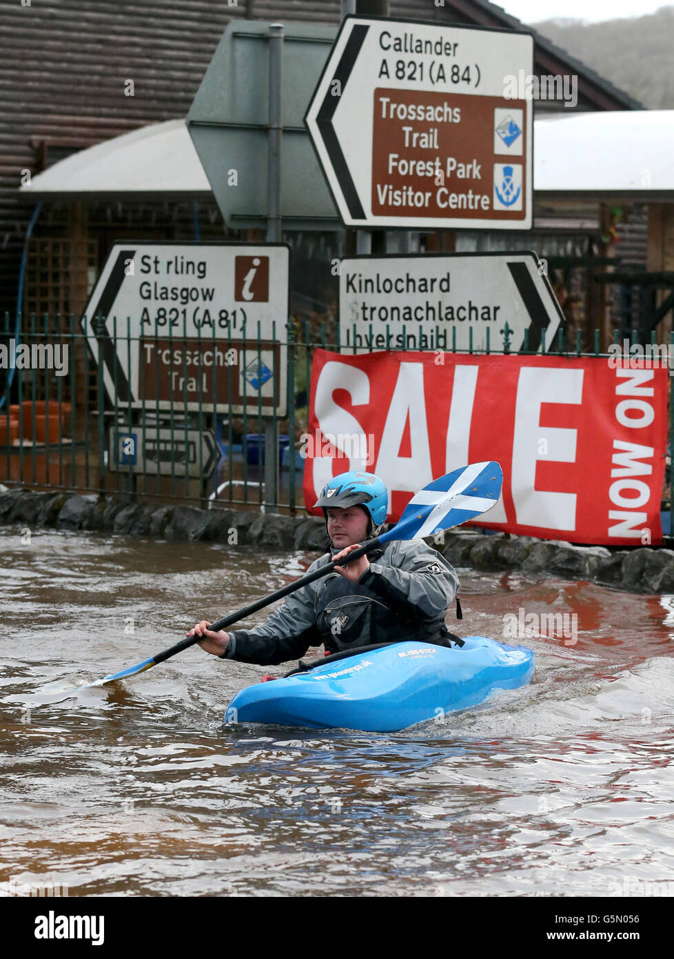 Grant Bruce canoes through Aberfoyle which has been flooded after the ...