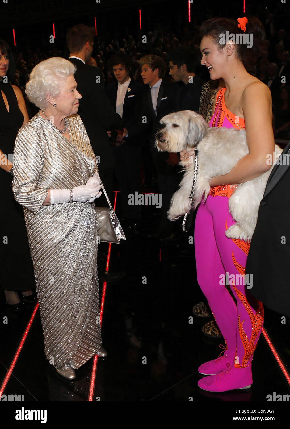 Queen Elizabeth II greets Ashleigh and her performing dog Pudsey after ...