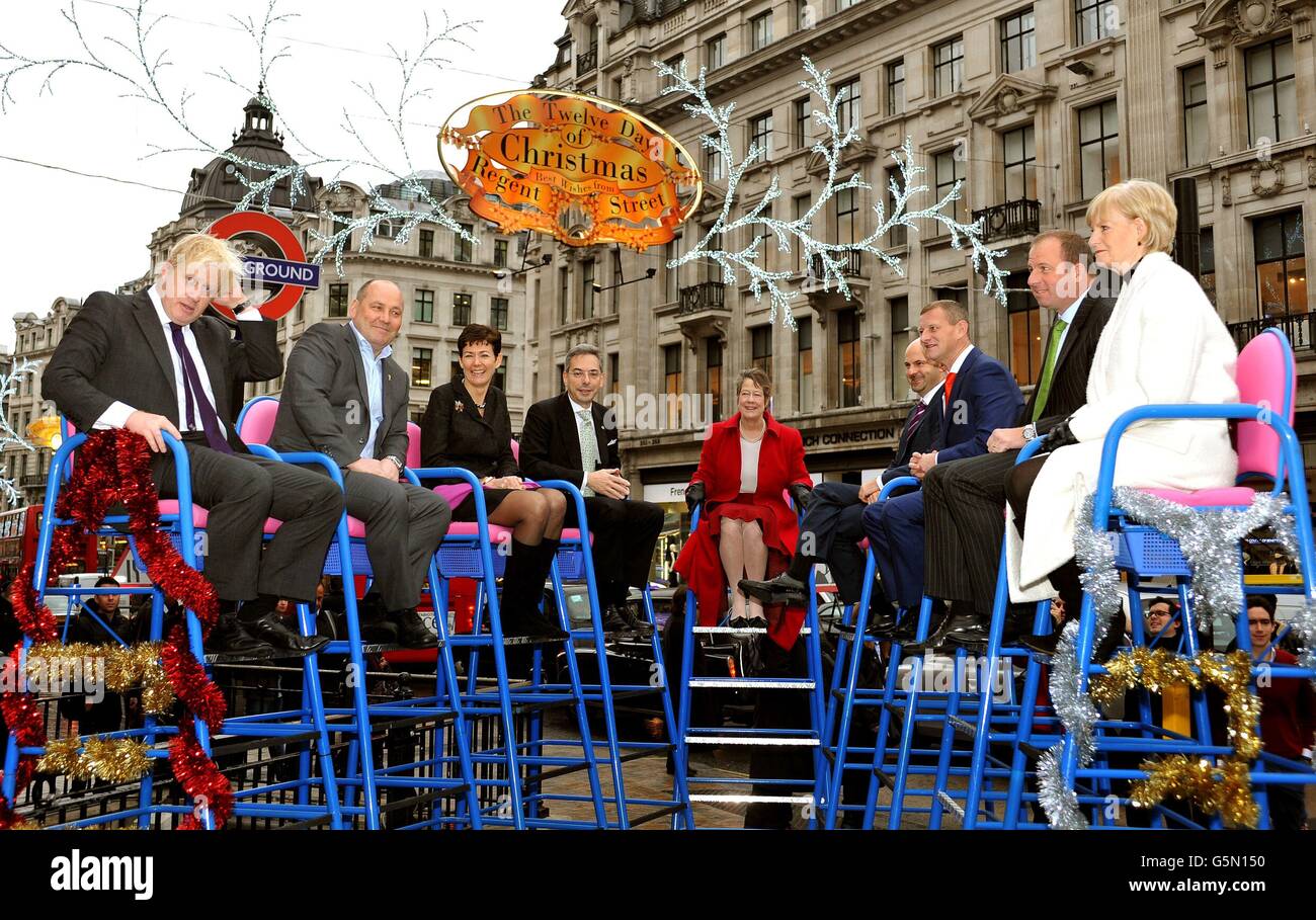 Boris Johnson (left) the Mayor of London sits in a high chair at Oxford ...
