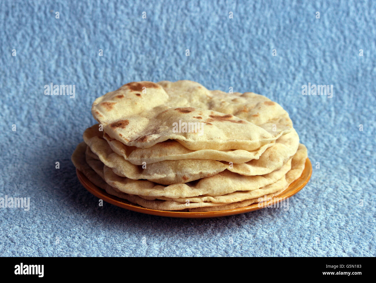 Chapatis on plate hi-res stock photography and images - Alamy