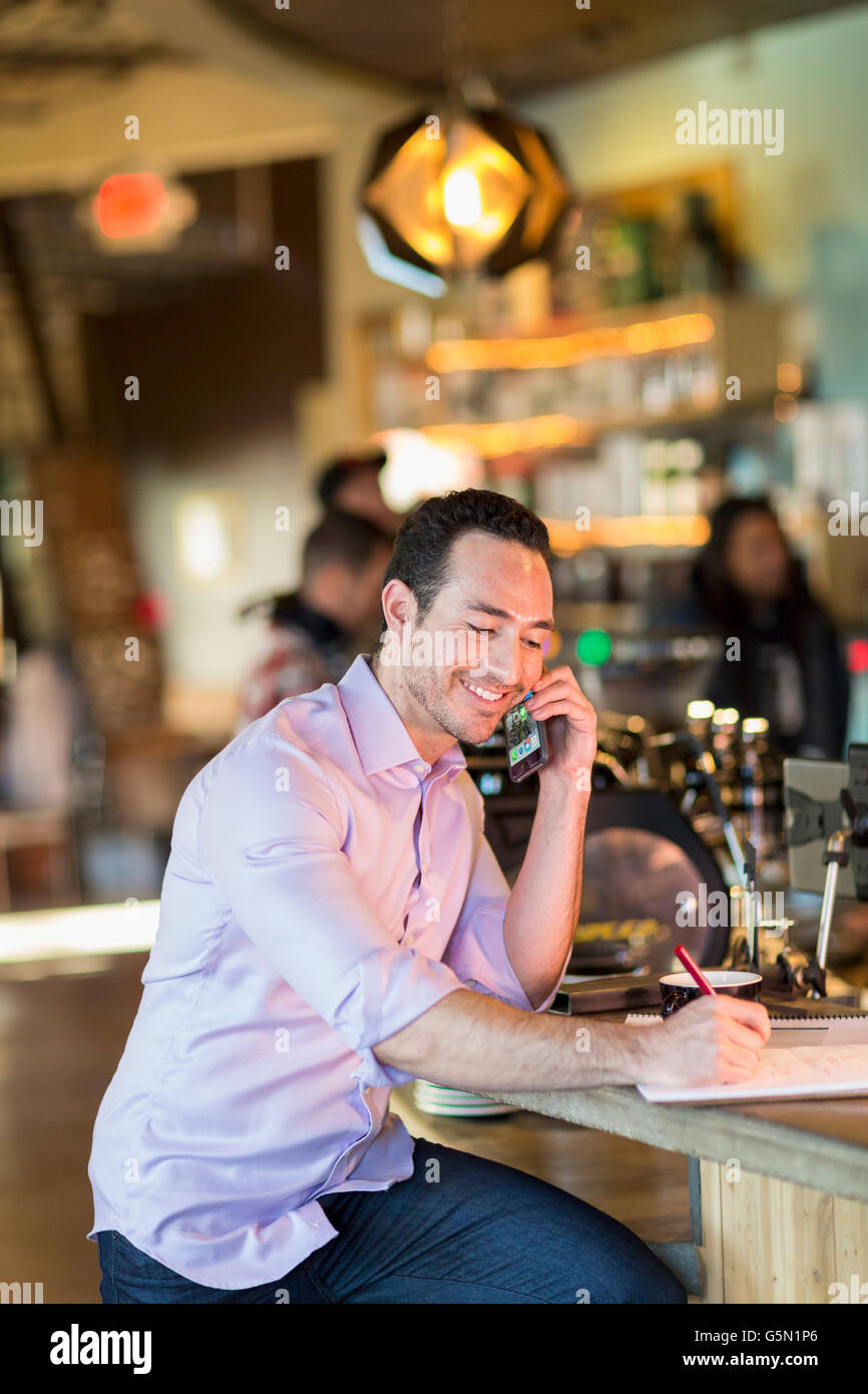 Mature businessman receiving good hi-res stock photography and images ...