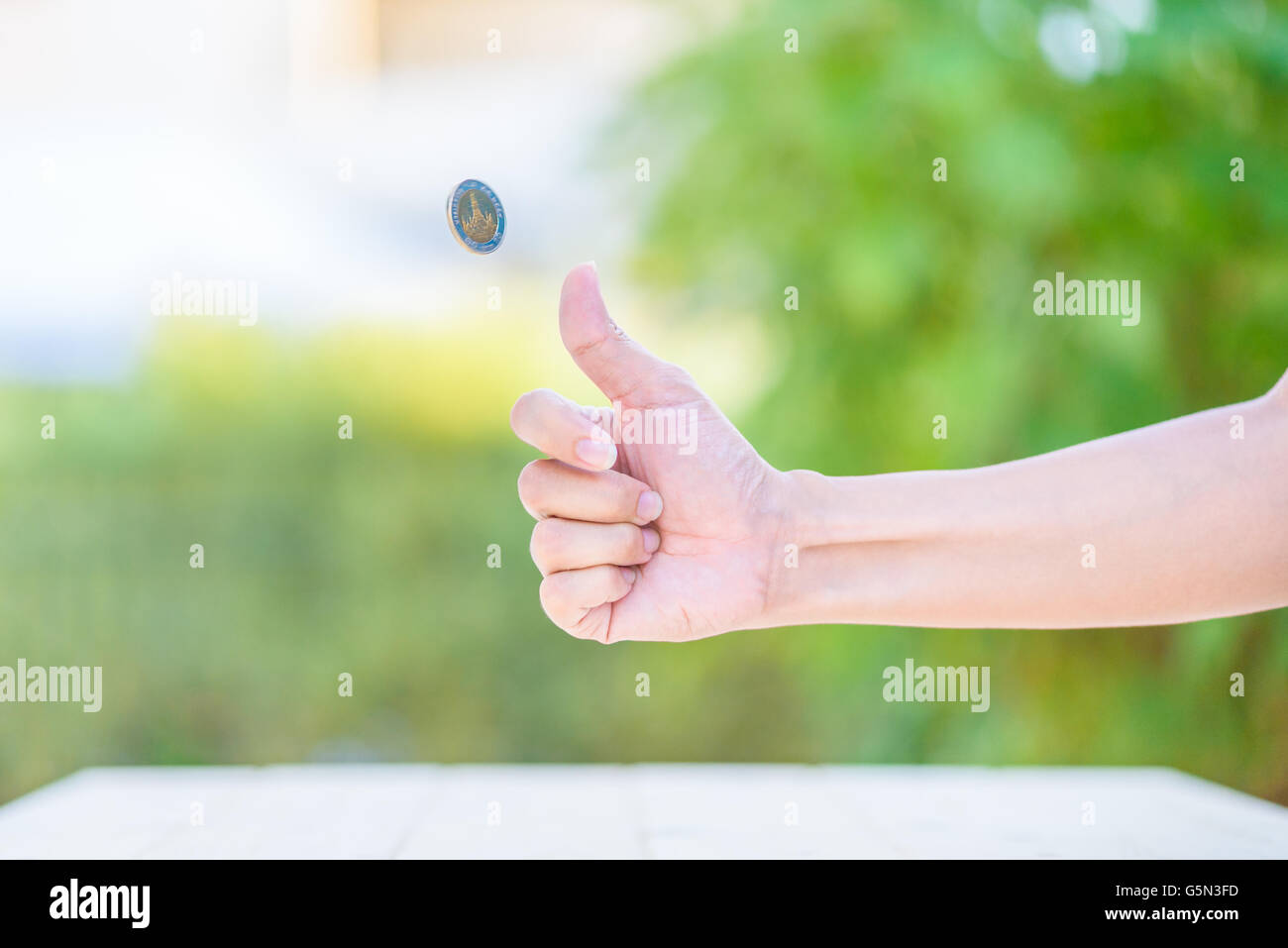 Toss coin hi-res stock photography and images - Alamy