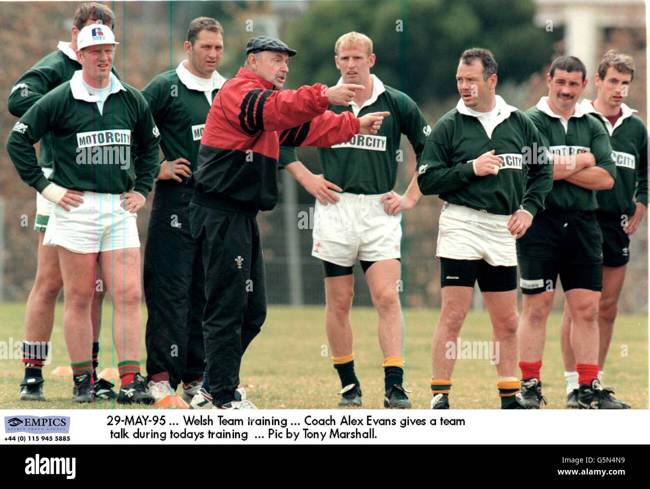 Coach alex evans gives a team talk during training hi-res stock ...
