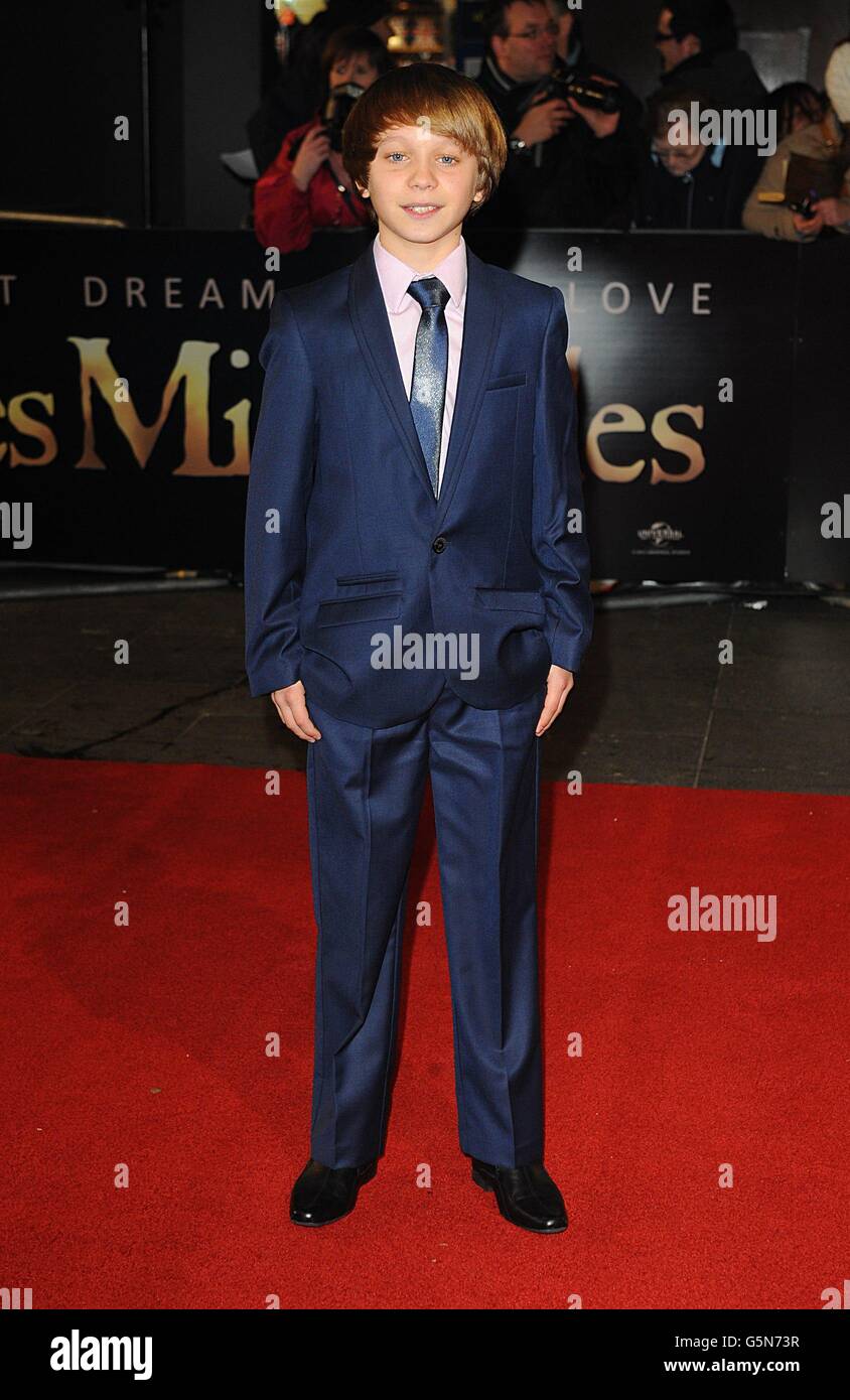 Daniel Huttlestone arrives at the premiere of Les Miserables at the ...