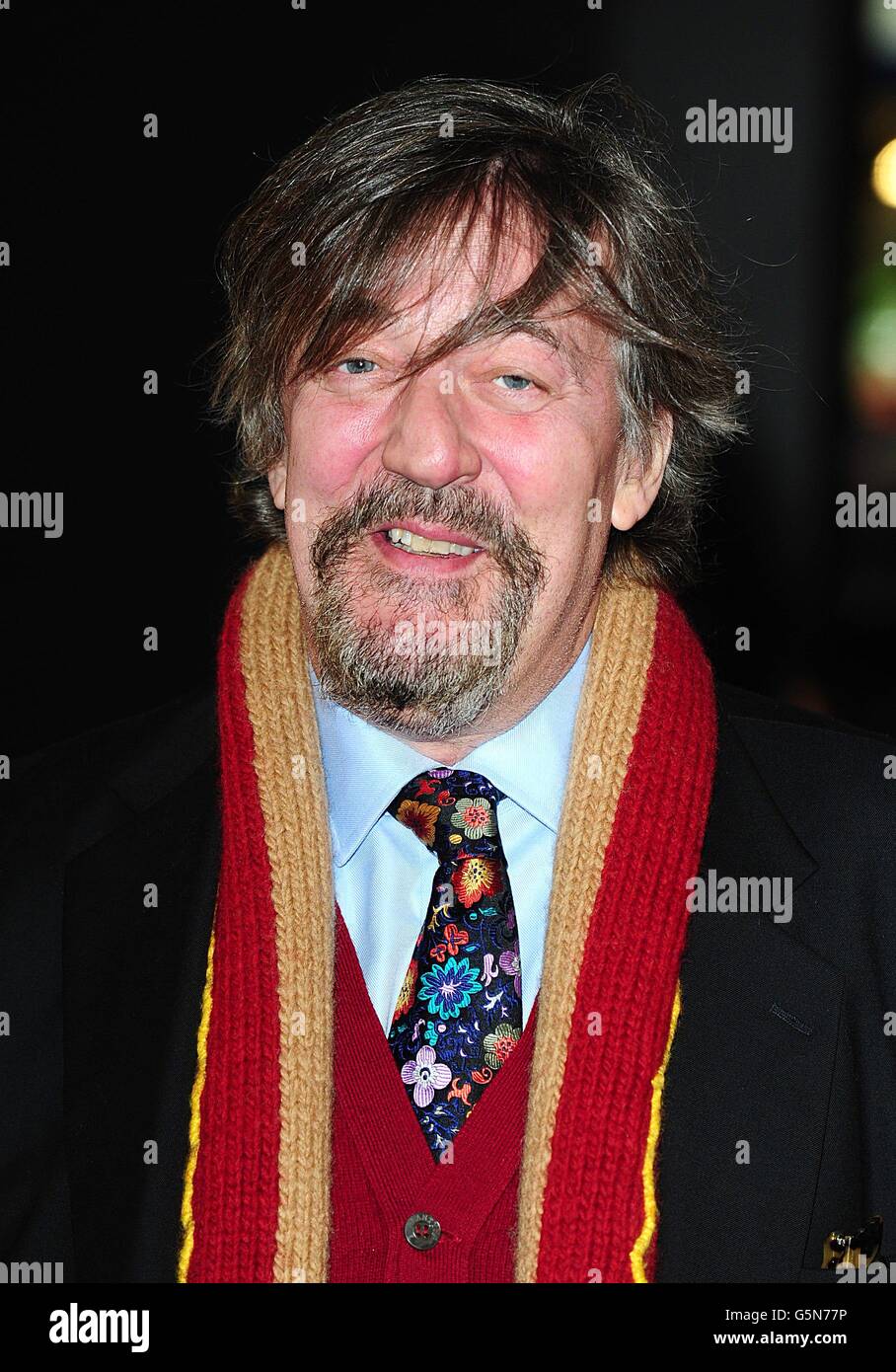 Stephen Fry arrives at the premiere of Les Miserables at the Empire ...