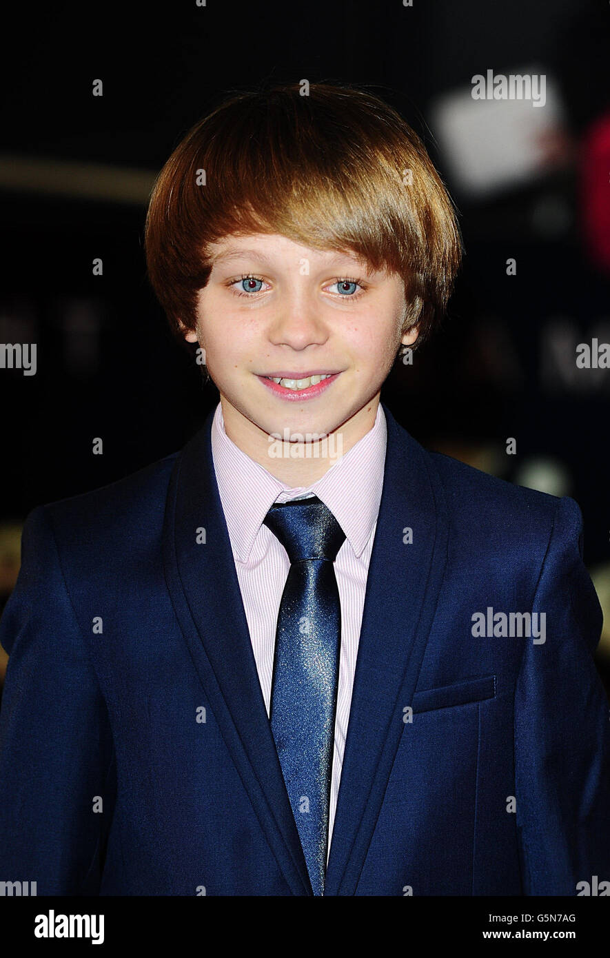 Daniel Huttlestone arrives at the premiere of Les Miserables at the ...