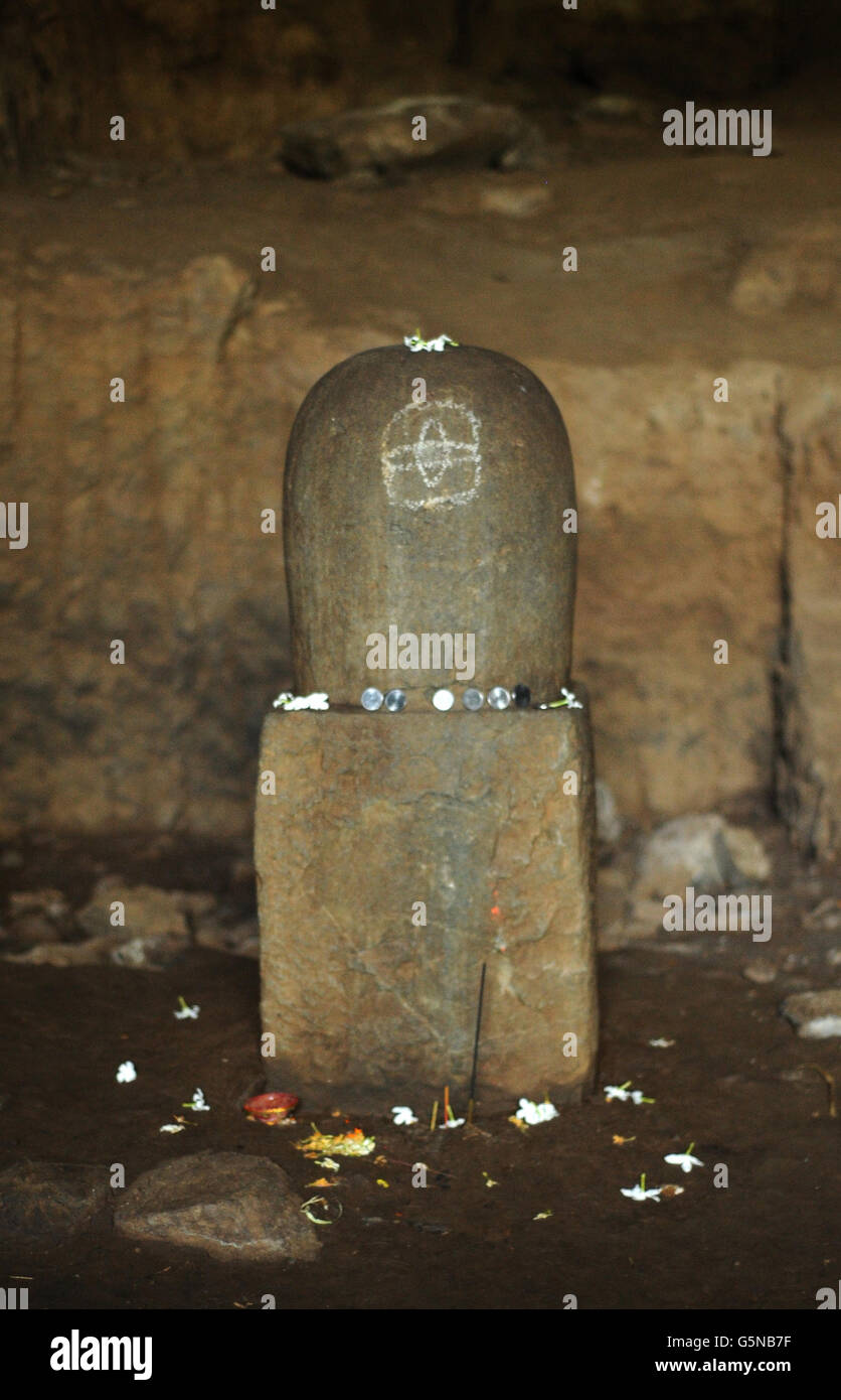 A sacred stone representing the God Shiva is seen inside the Elephanta ...