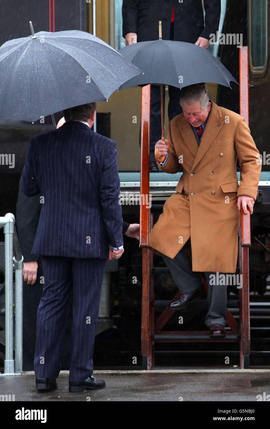 The Prince of Wales is greeted by Lord Lieutenant Byron Lewis as he ...