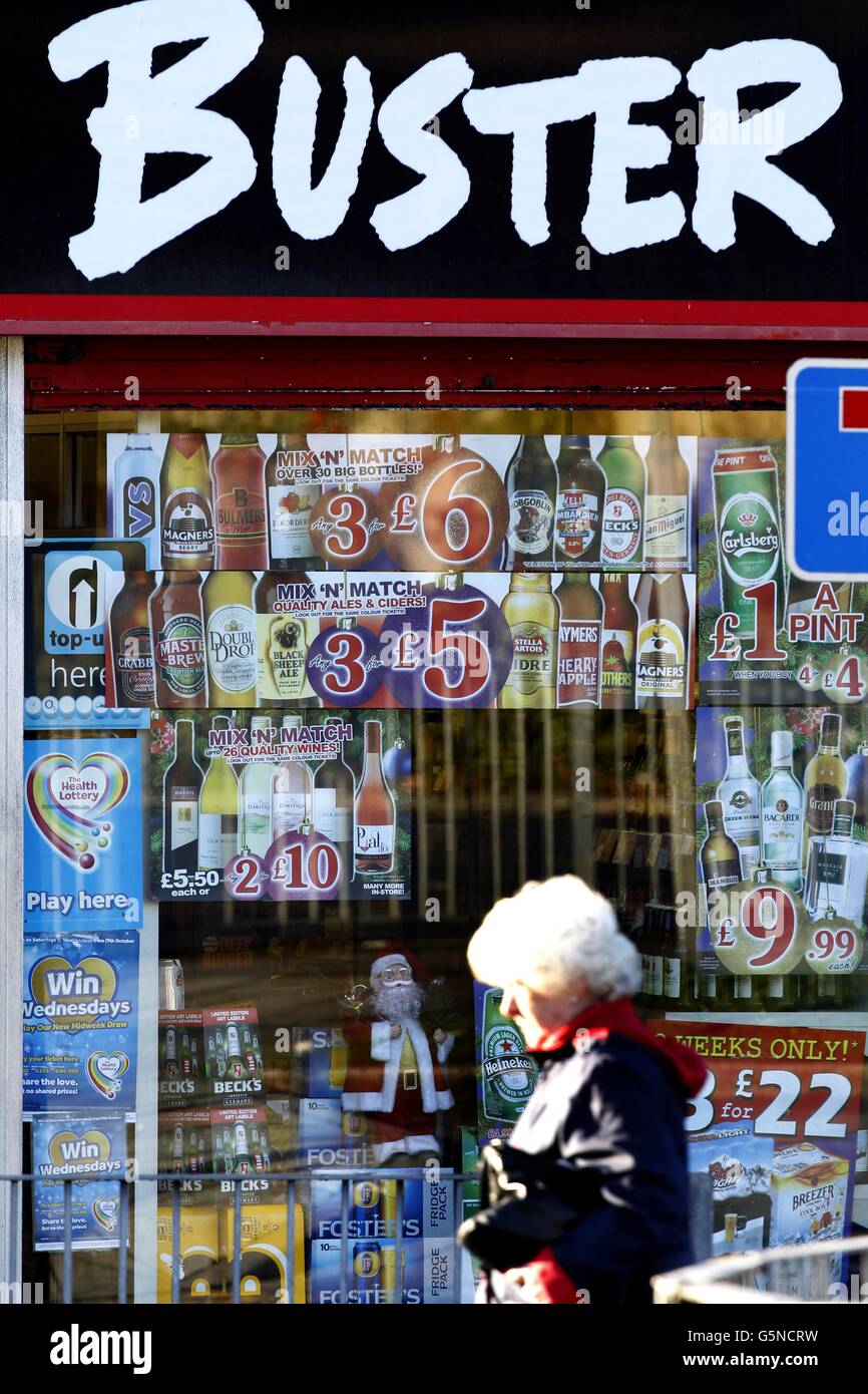 General view of Alcohol posters in a Booze Buster shop window Stock ...