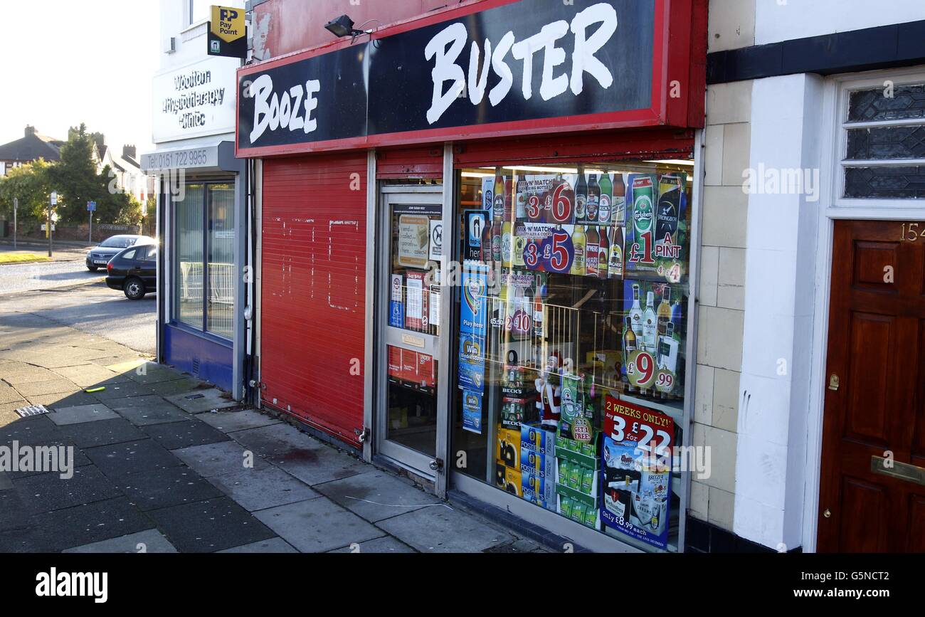 General view of Alcohol posters in a Booze Buster shop window Stock ...