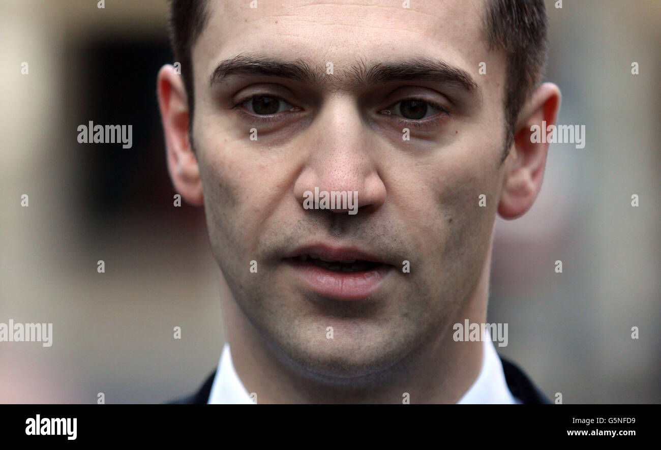 The boyfriend of late singer Amy Winehouse, Reg Traviss, arriving at ...