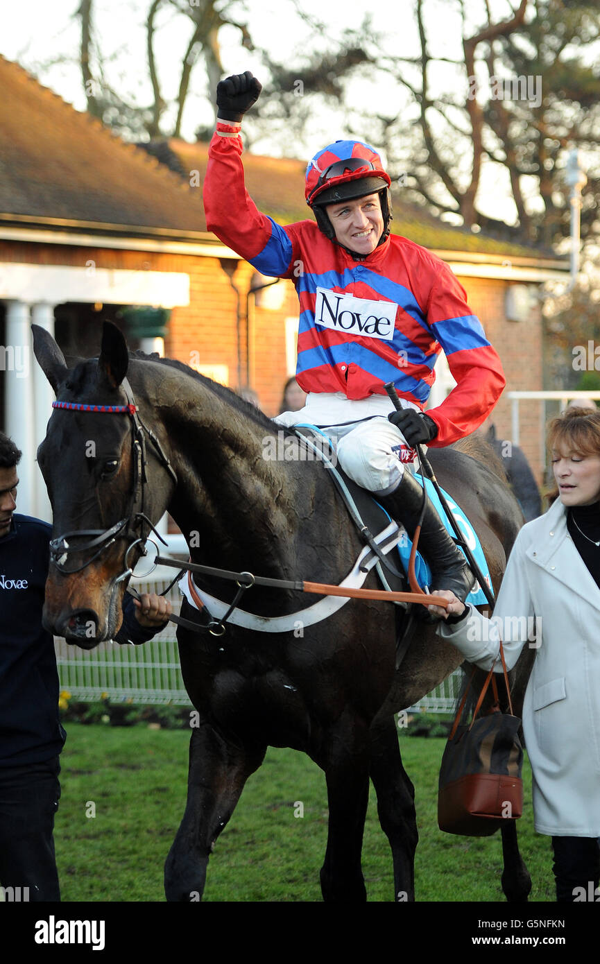 Jockey Barry Geraghty pumps his fist into the air as he is lead into ...