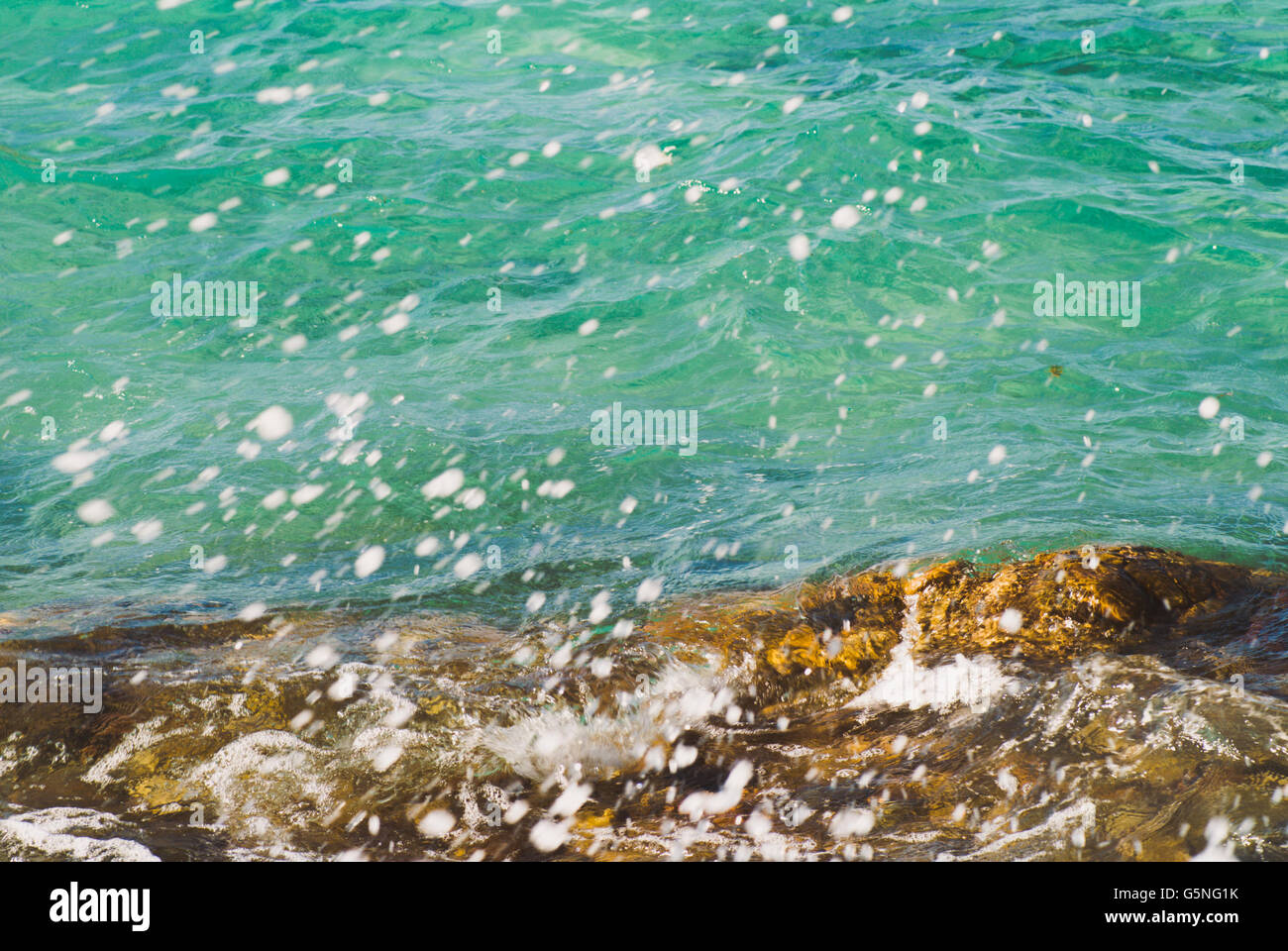 Photo of beautiful clear turquoise sea ocean water surface with ripples ...