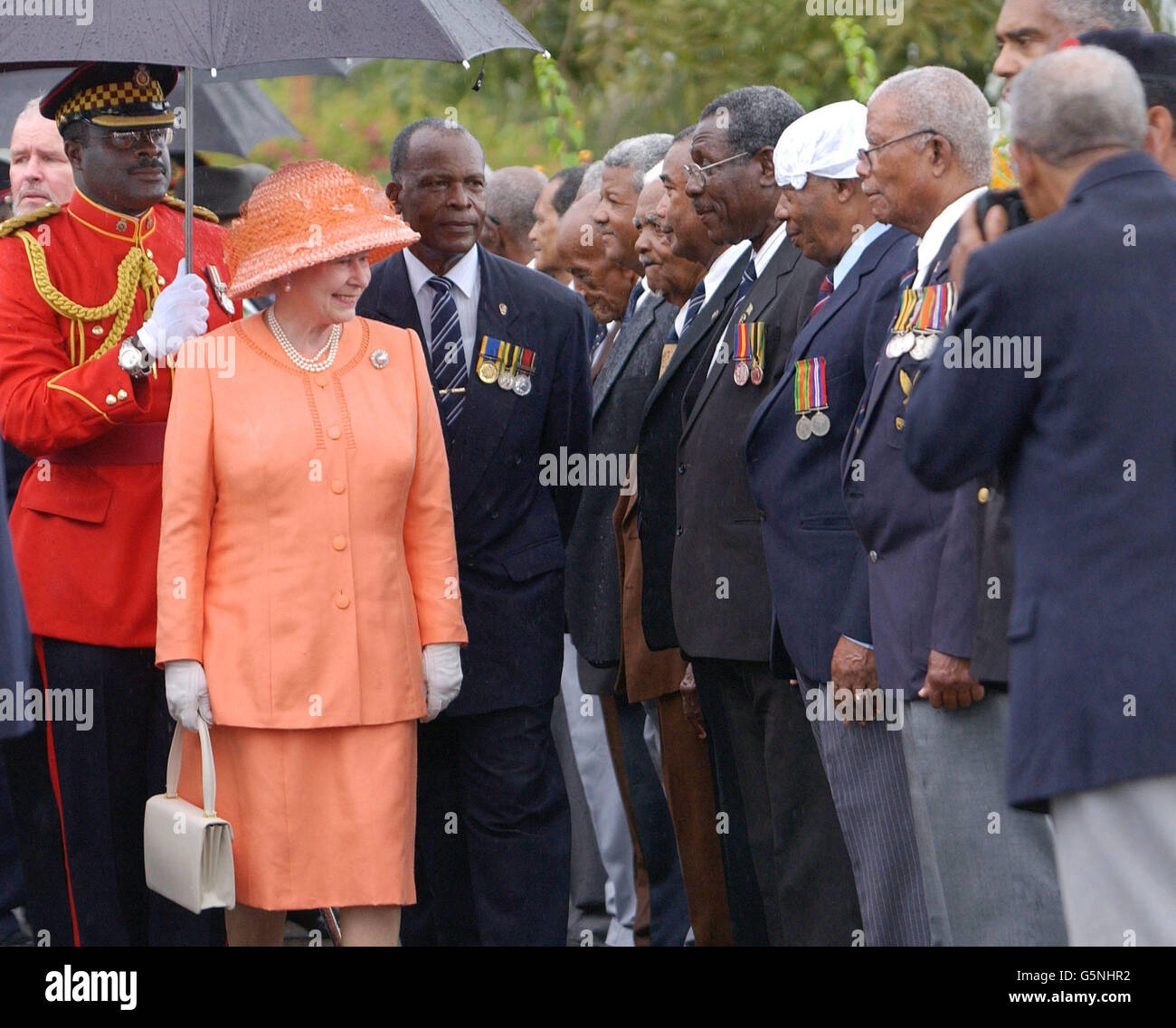 Queen Elizabeth II, accompanied by appointed Equerry Major Daniel Price ...