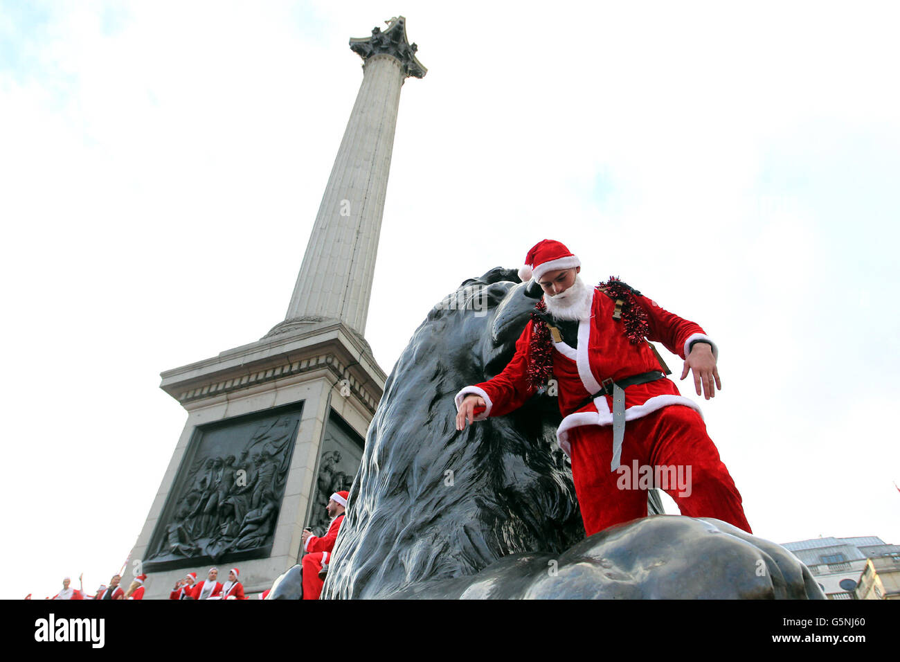 Santa flash mob Stock Photo - Alamy