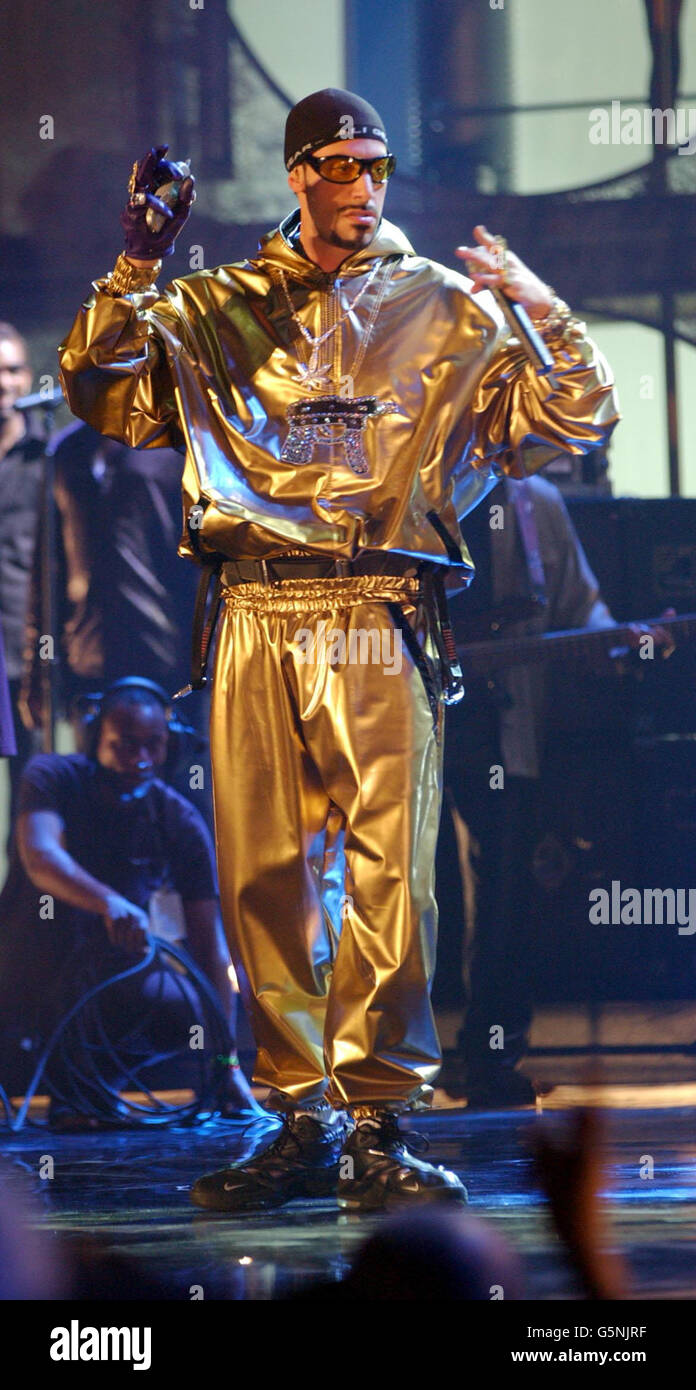 Yellow track suit hi-res stock photography and images - Alamy