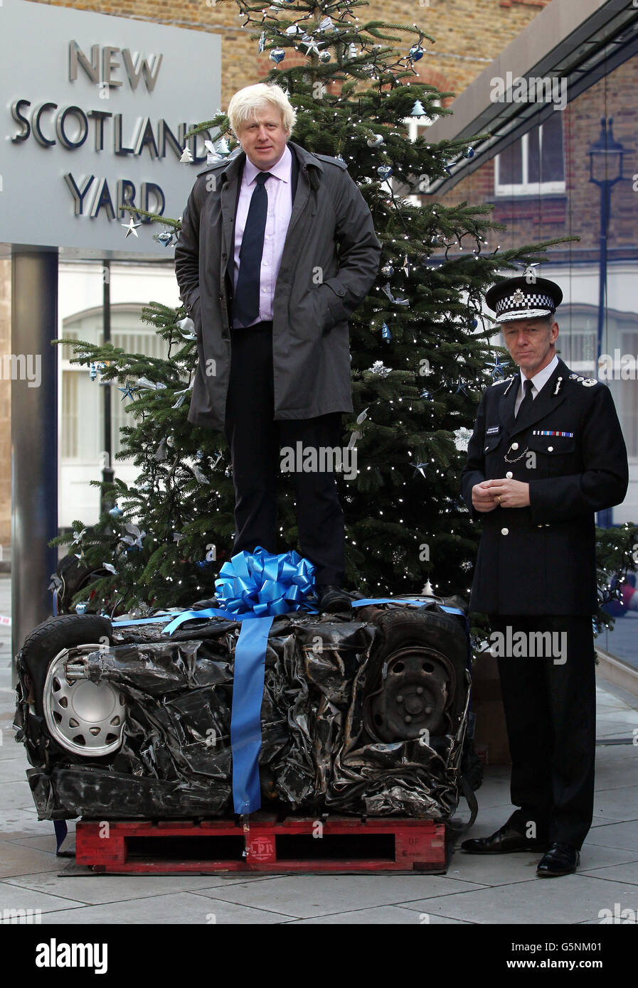 Metropolitan Police Commissioner Bernard Hogan-Howe and Mayor of London ...