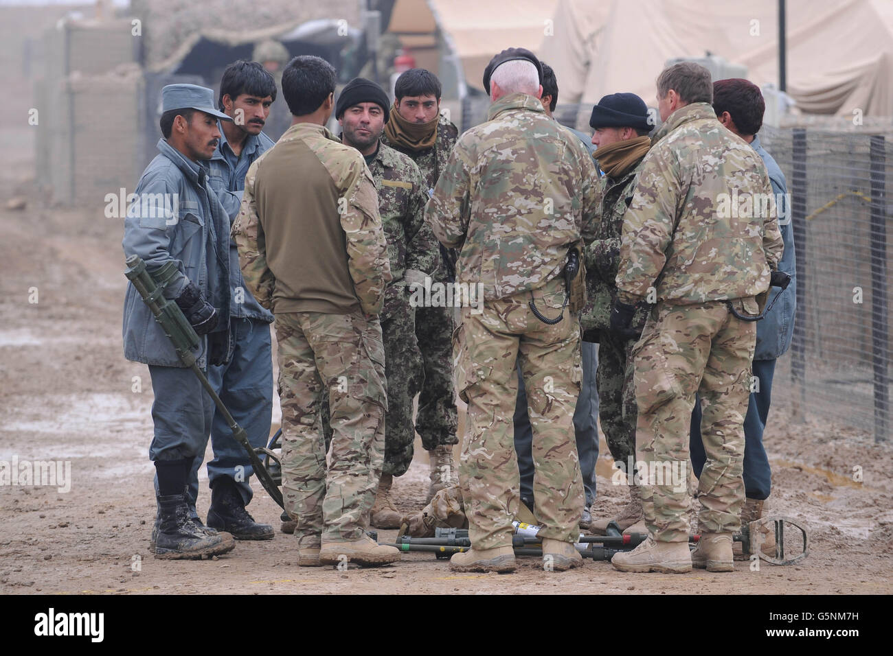 Sergeant Waysidin (third from left) teaches members of the Afghan ...