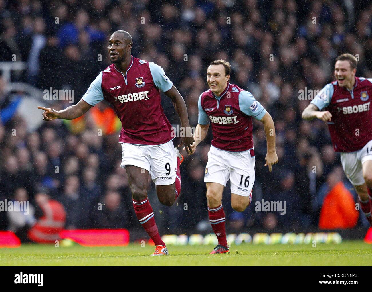 West Ham United's Carlton Cole (left) celebrates scoring his teams ...