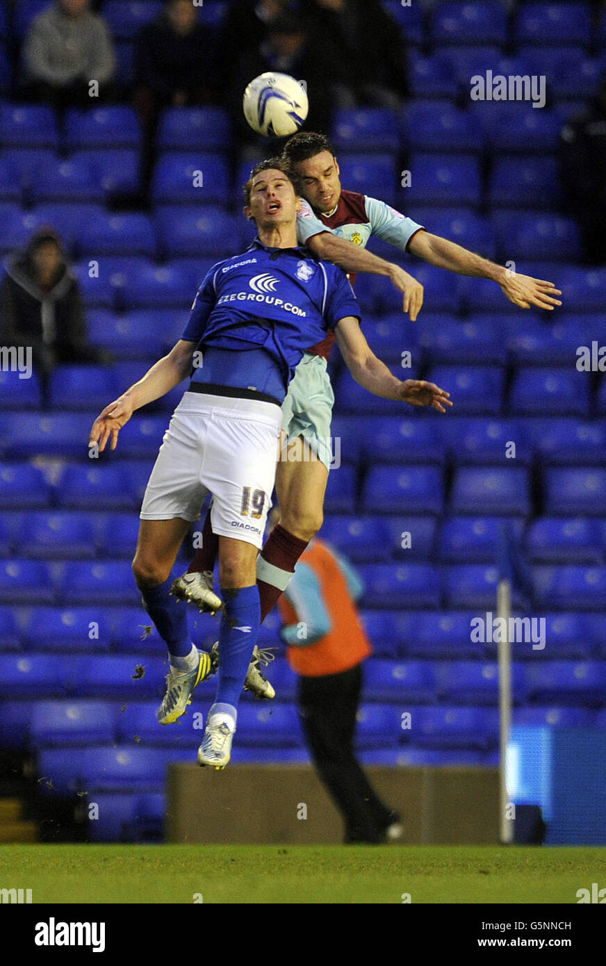 Birmingham City's Nikola Zigic (left) and Burnley's Michael Duff ...