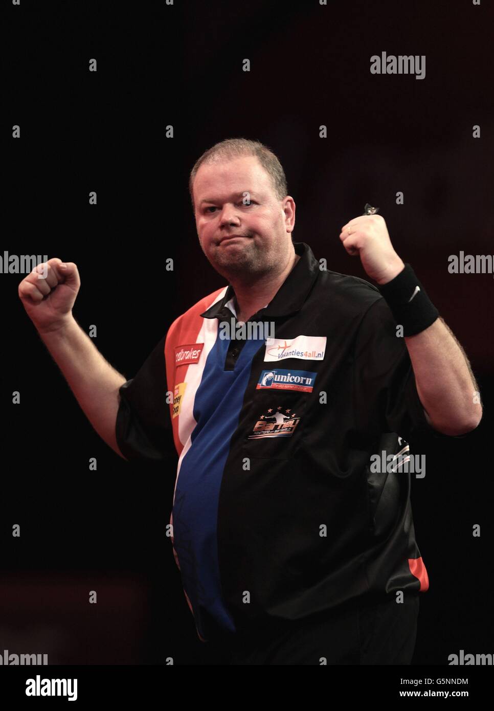 Raymond van Barneveld celebrates winning the second set against Brendan ...